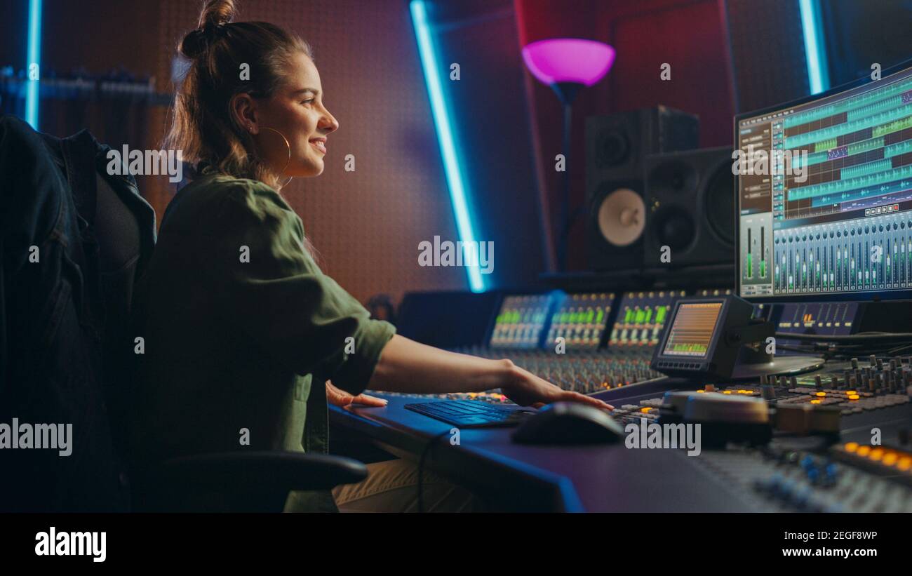 Beautiful, Stylish Female Audio Engineer and Producer Working in Music ...