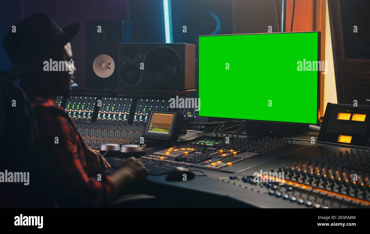 Portrait of Stylish Audio Engineer Producer Working in Music Record ...