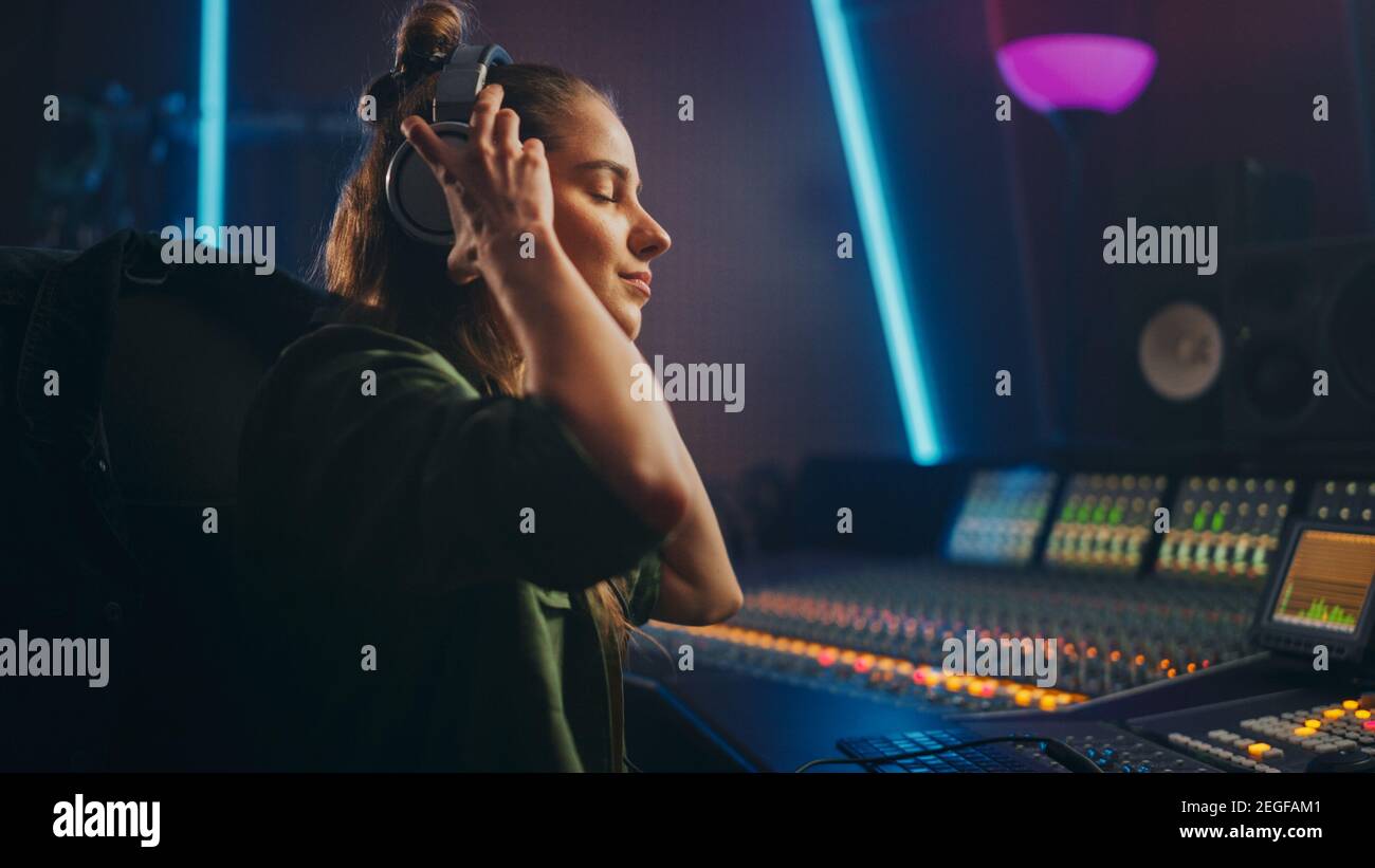 Portrait of Beautiful Female Artist Musician in Music Recording Studio ...