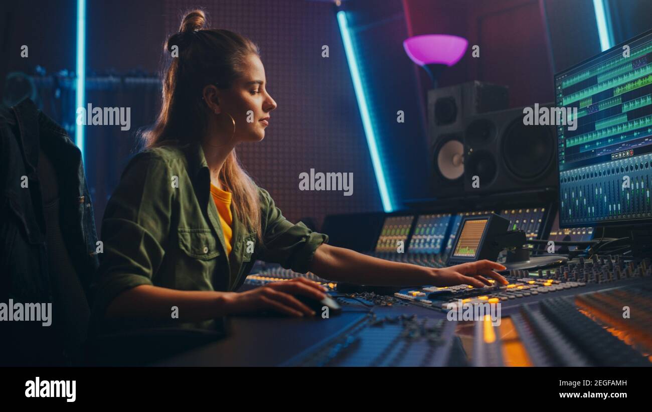 Female Audio Engineer Working in Music Recording Studio, Uses Mixing ...