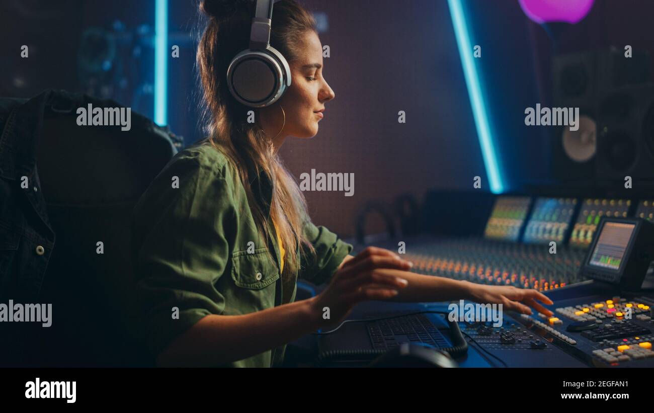 Portrait of Beautiful Female Artist Musician in Music Recording Studio ...