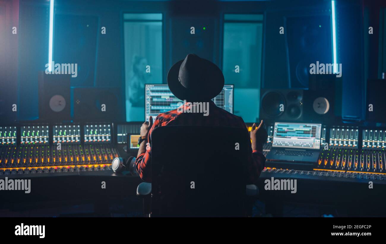 Producer, Audio Engineer Uses Control Desk for Recording New Album ...