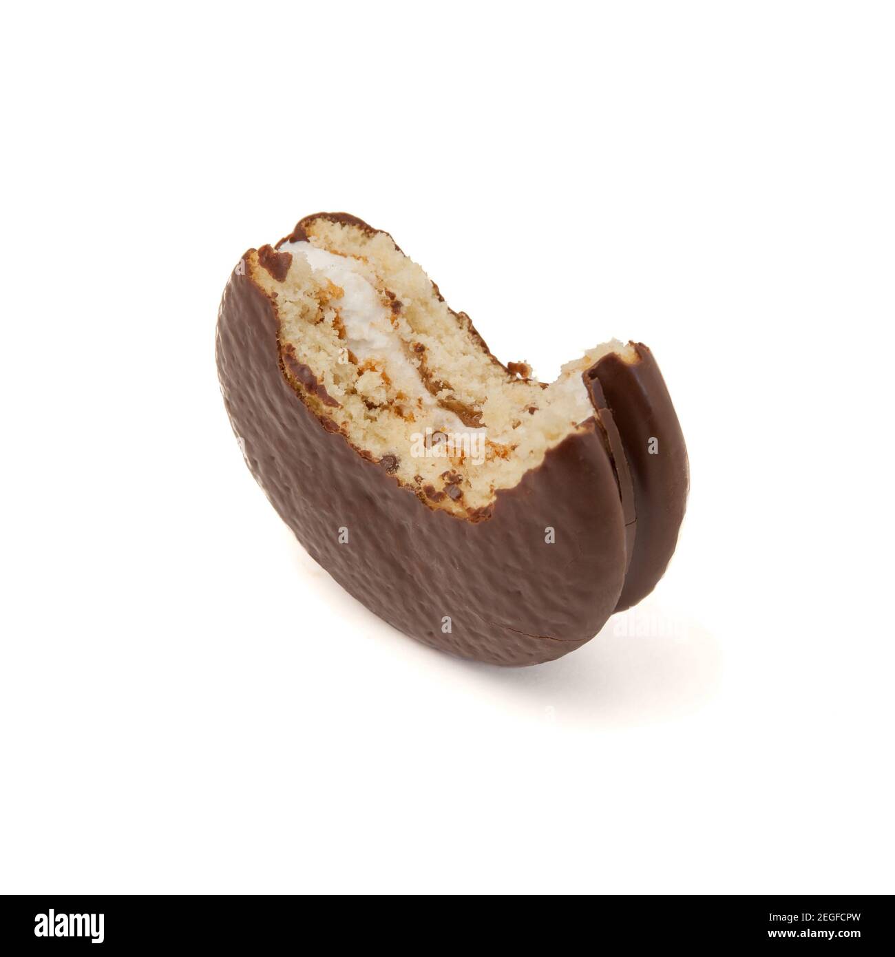 A chocolate cake chokopie snack bitten off isolated on a white ...