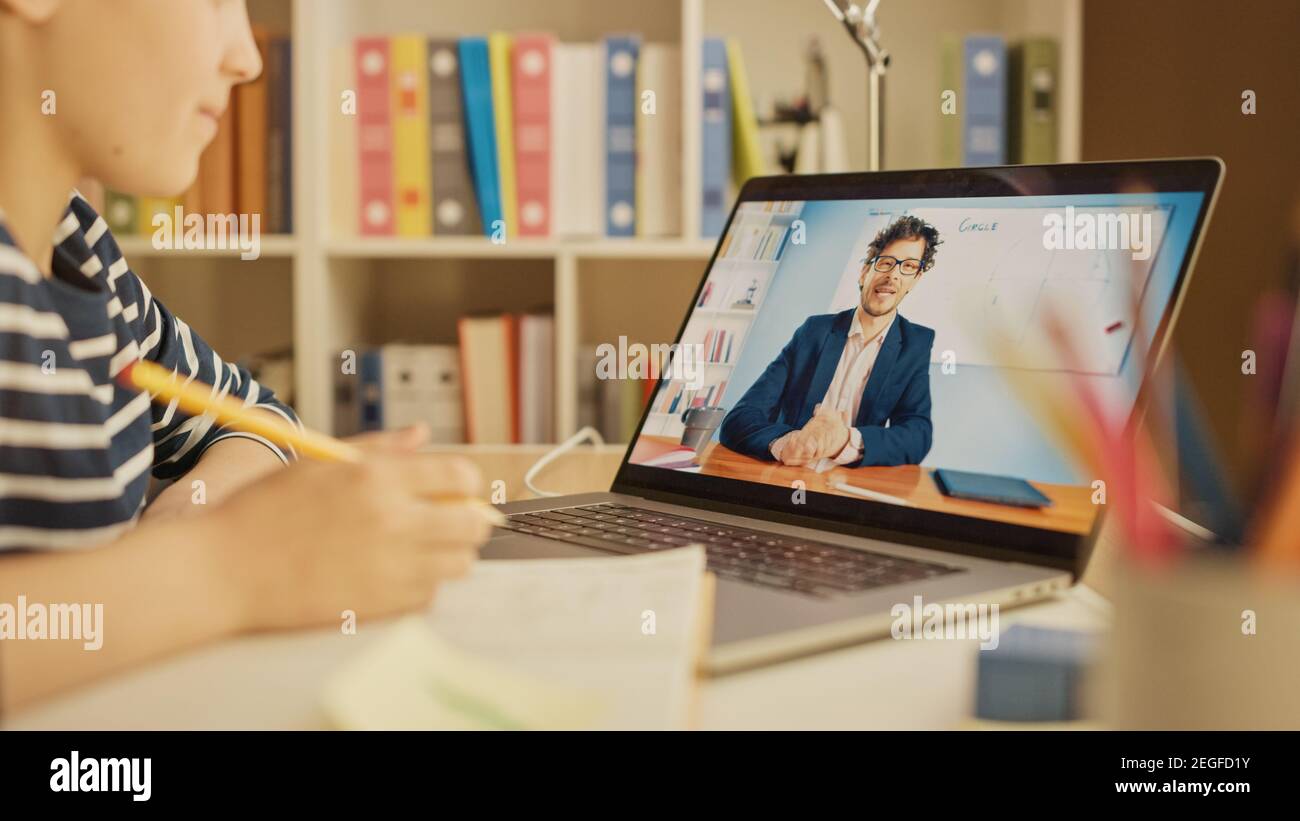Smart Little Boy Uses Laptop for Video Call with His Teacher. Screen ...
