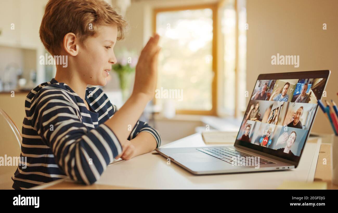 Cute Little Boy Uses Laptop with Conference Video Call Software to Talk ...