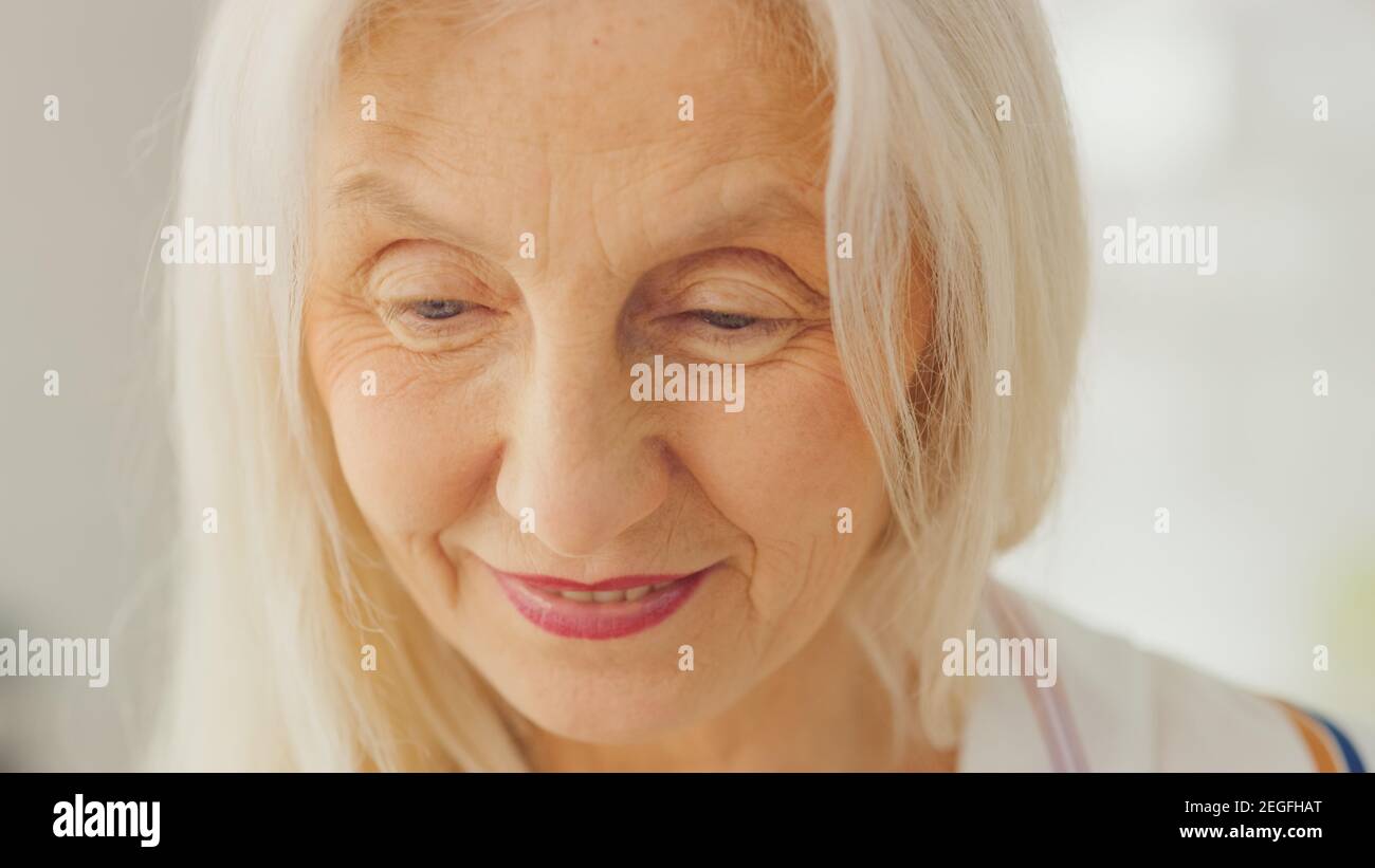 Authentic Beauty Portrait Shot of Senior Female Pensioner in a Bright ...