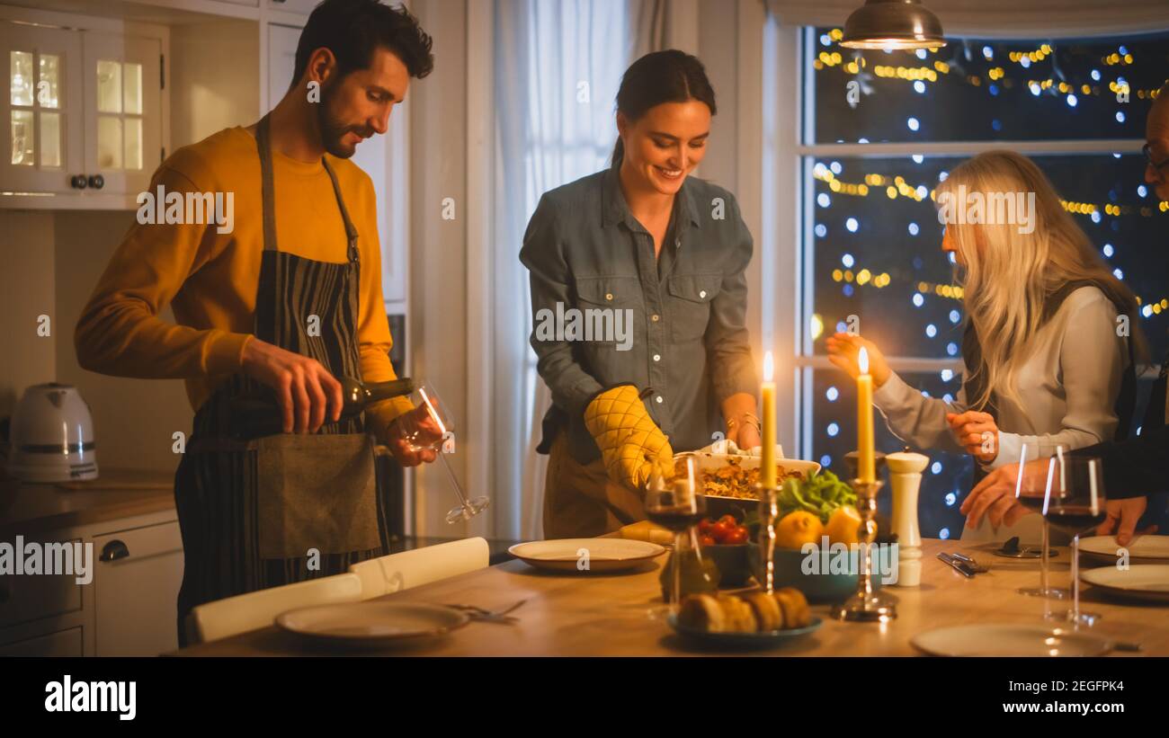 Family eating dinner around table hi-res stock photography and images ...