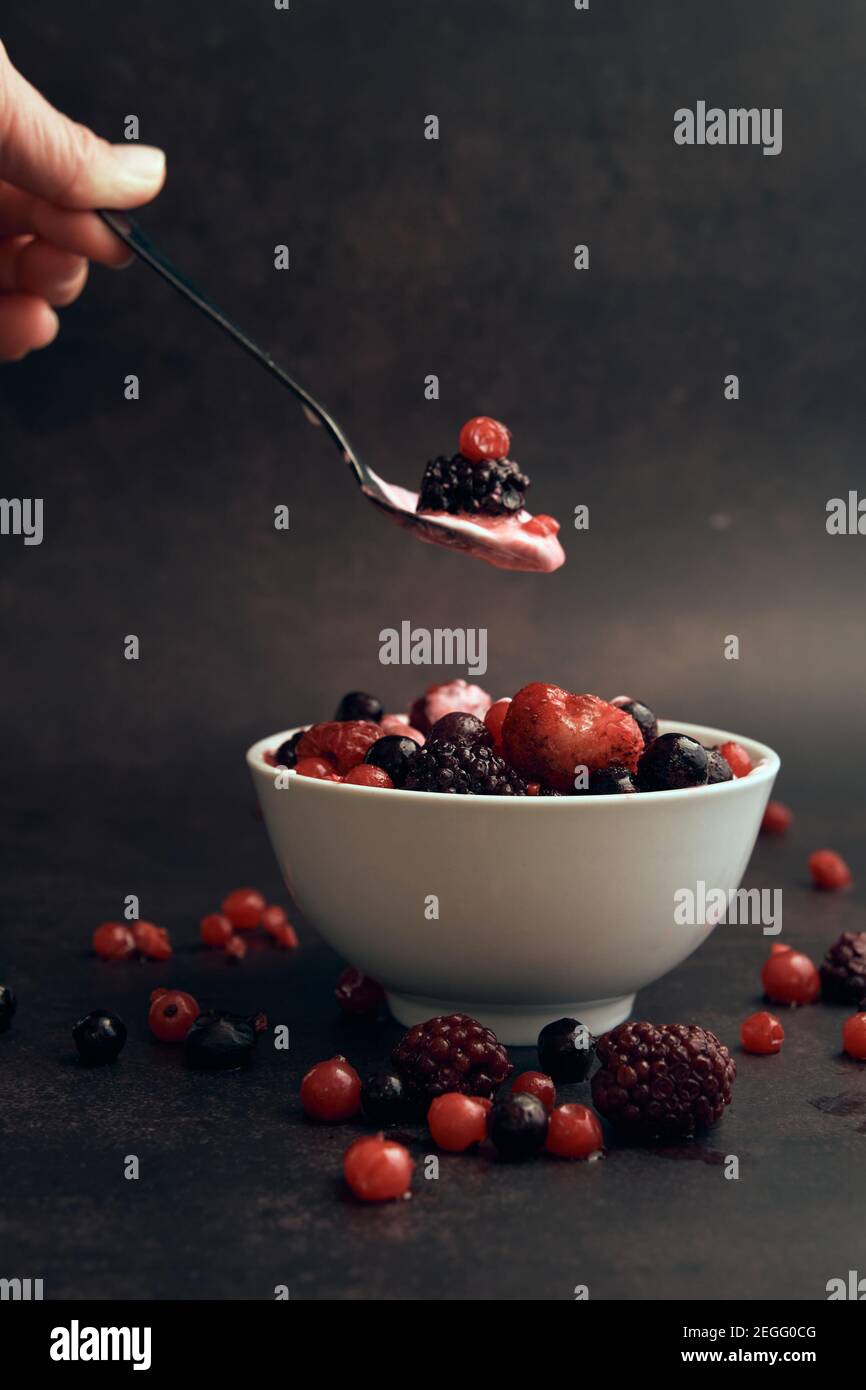 natural yogurt and red berries Stock Photo - Alamy