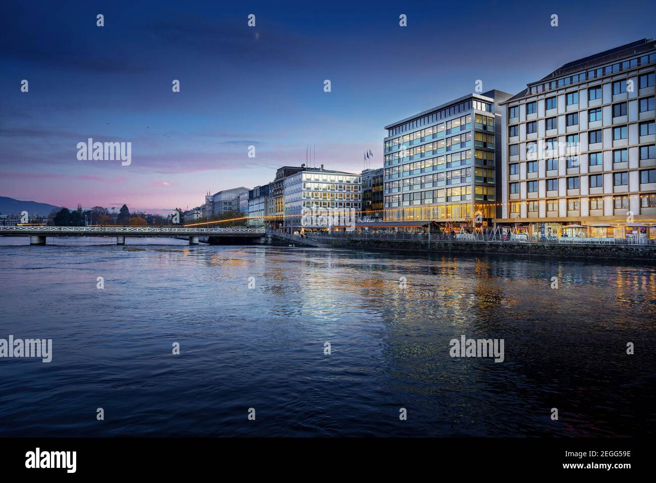 Rhone River and Geneva skyline at night - Geneva, Switzerland Stock ...