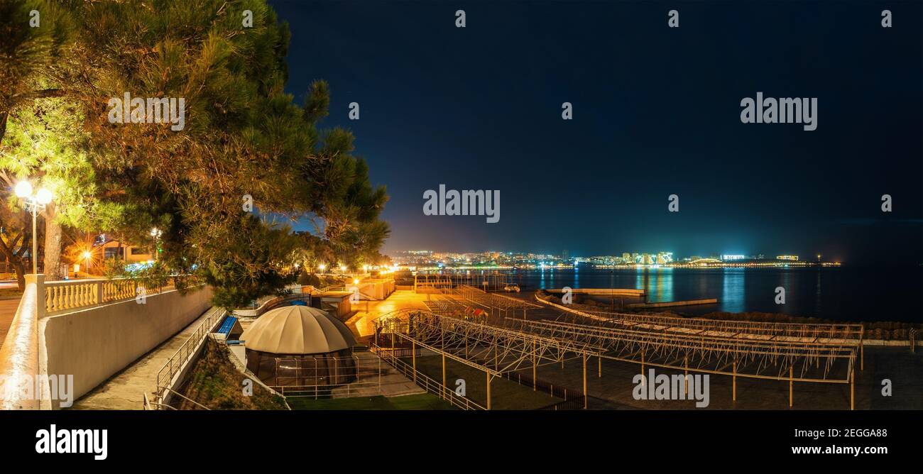 Gelendzhik resort city illuminated promenade and sea bay at night, copy ...