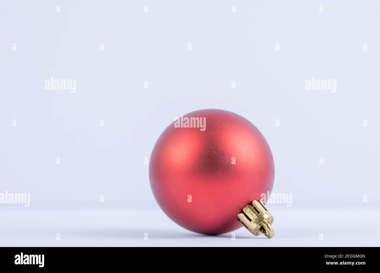 A red glittering or shining oak tree ball on a white background Stock ...