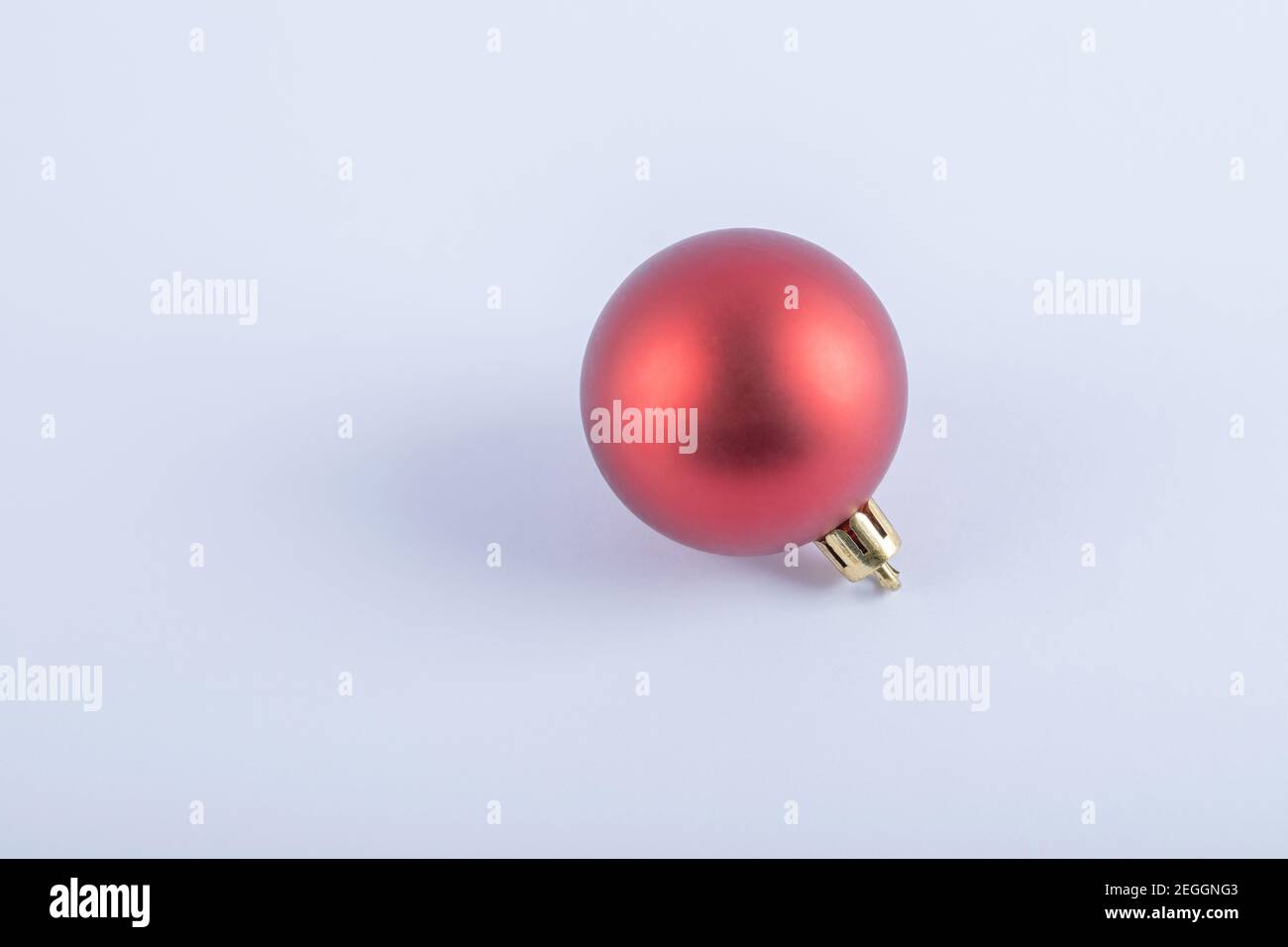 A red glittering or shining oak tree ball on a white background Stock ...
