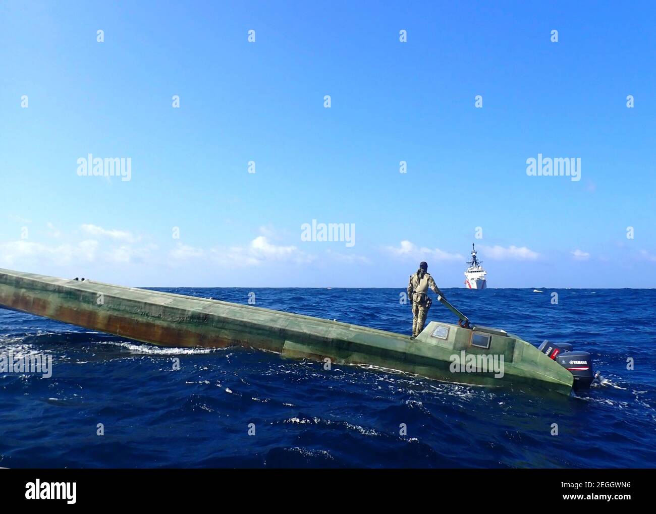 A U.S. Coast Guard boarding crew member from the Cutter Bertholf ...