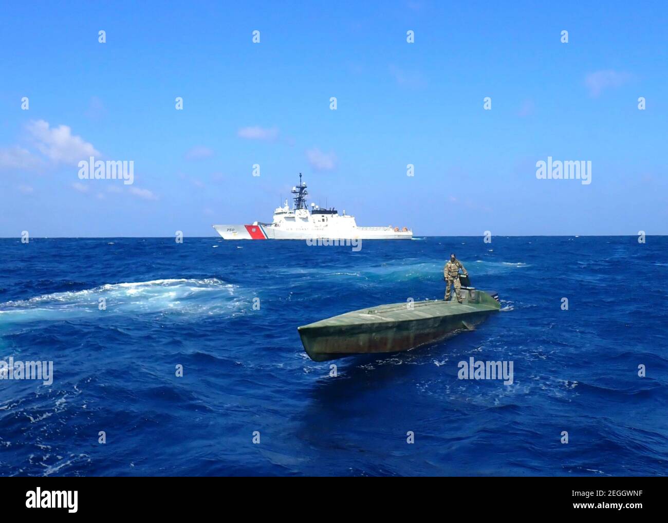 A U.S. Coast Guard boarding crew member from the Cutter Bertholf ...