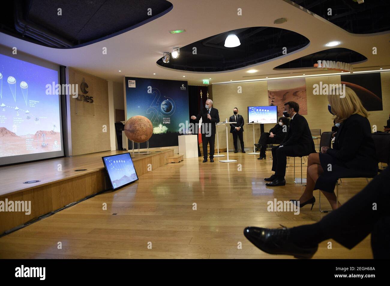 French President Emmanuel Macron and his wife Brigitte Macron attend a ...
