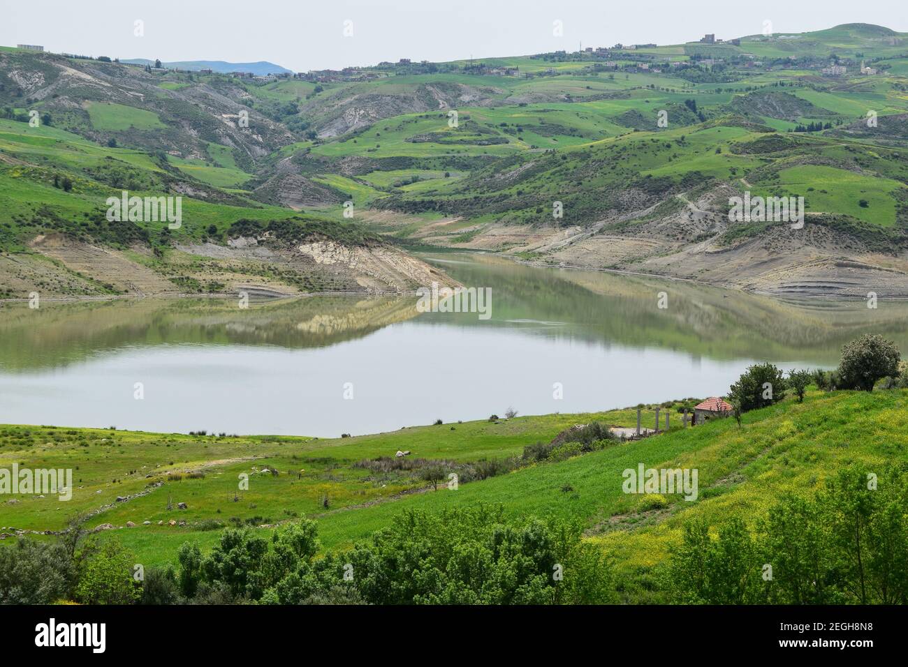 Aerial view village between mountains hi-res stock photography and ...
