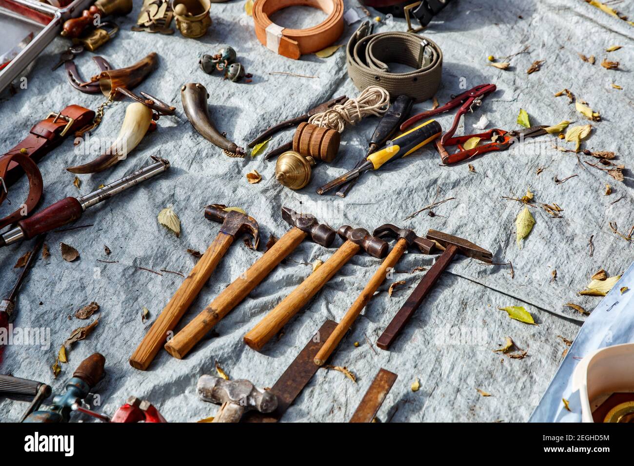Different work tools at the autumn background Stock Photo - Alamy