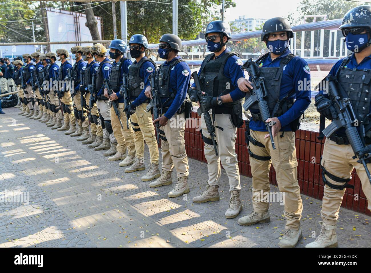 SWAT officials are standing in front of Central Shaheed Minar in the ...