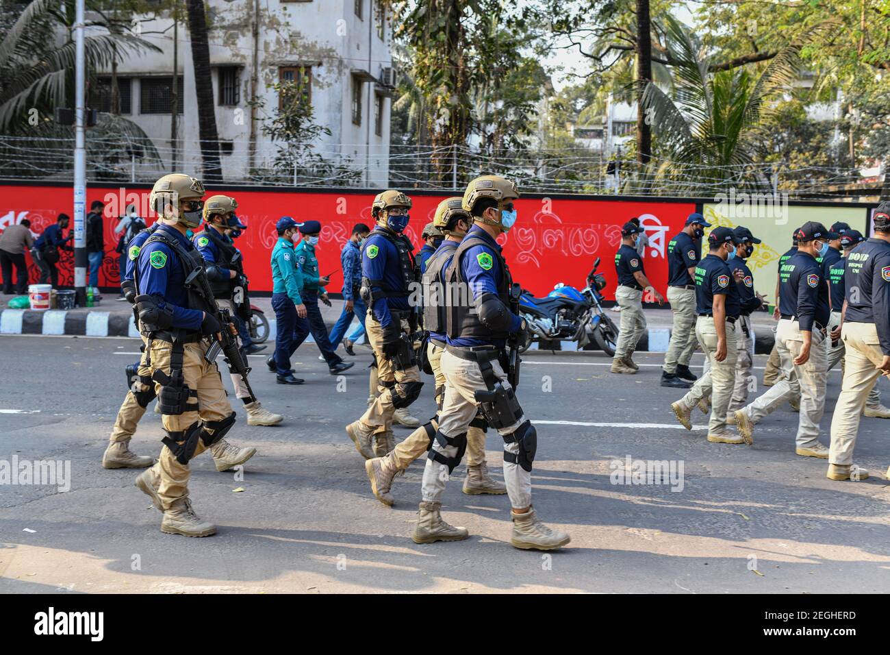 SWAT officials inspect in front of Central Shaheed Minar in the capital ...