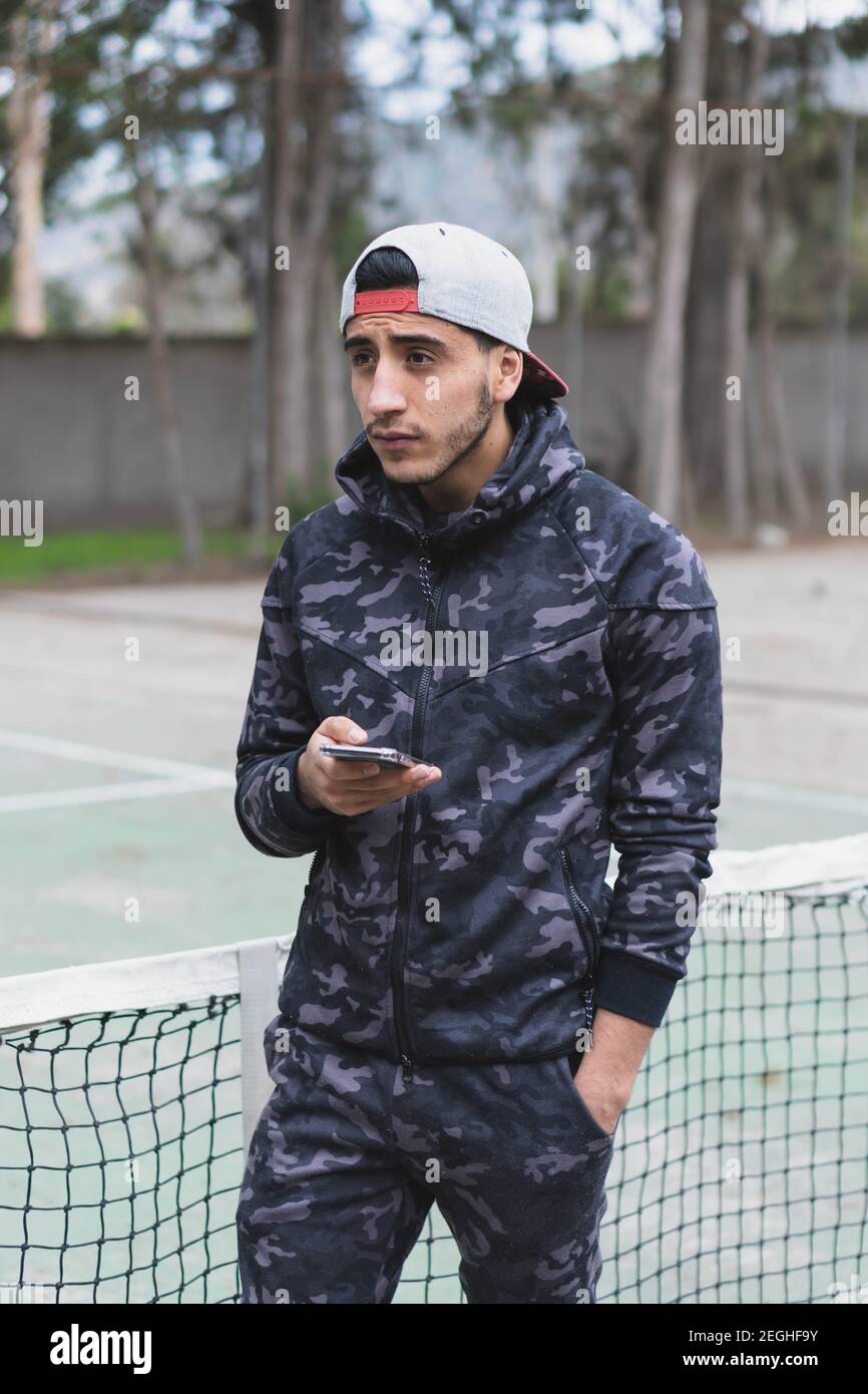 Getting ready to do a workout in the park Stock Photo - Alamy