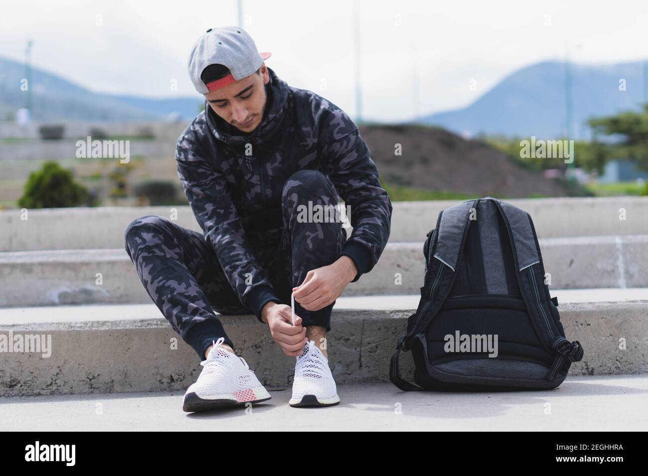Getting ready to do a workout in the park Stock Photo - Alamy