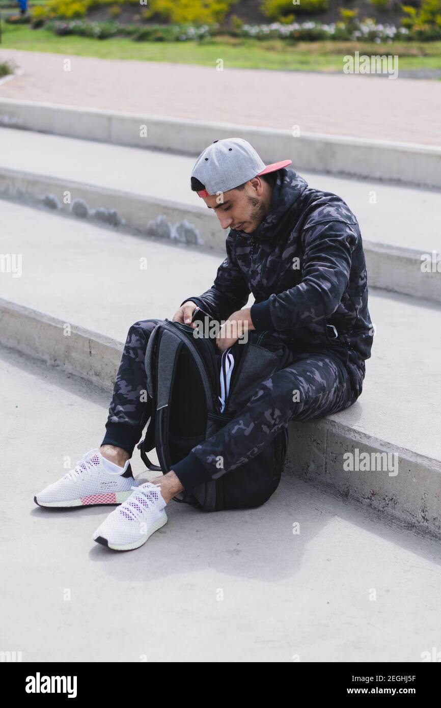 Getting ready to do a workout in the park Stock Photo - Alamy