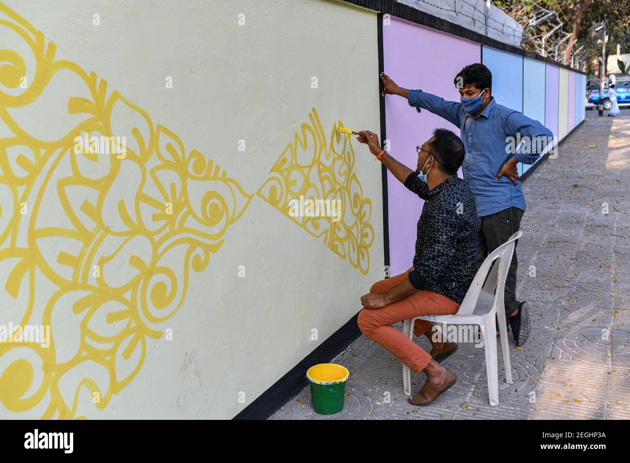 Work is underway to write on the walls and draw Alpana ahead of Central ...