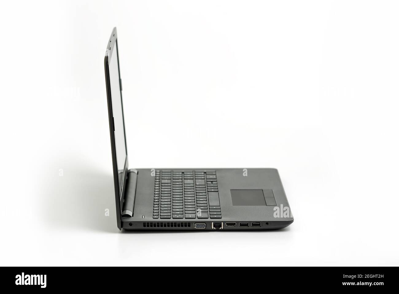 Laptop isolated on white background - side view with clipping path ...