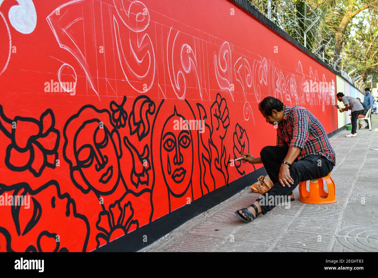 Work is underway to write on the walls and draw Alpana ahead of Central ...