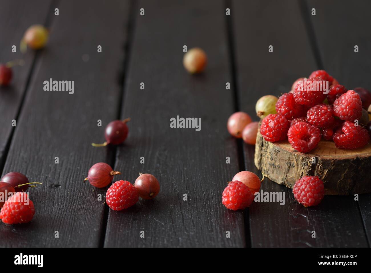 Fresh and sweet organic berries. Heap of ripe raspberries and ...