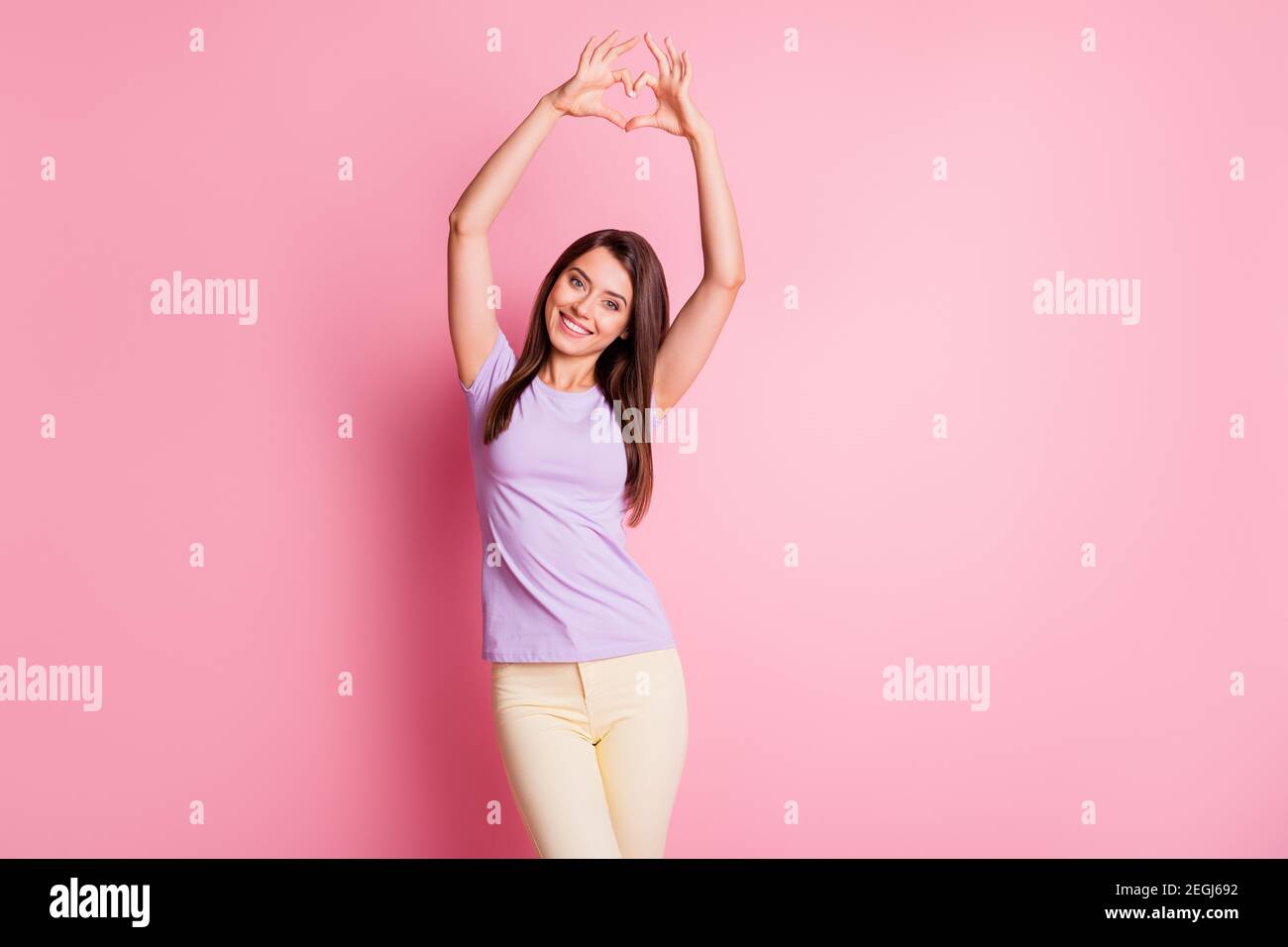 Photo portrait of lovely girlfriend demonstrating heart over head on ...
