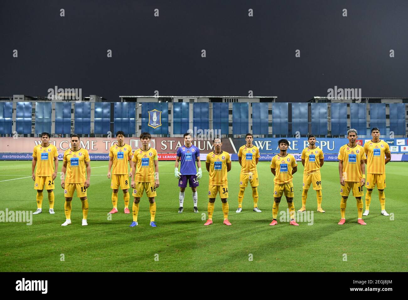 Port FC players pose for a photo before the Thai League 2020 match ...