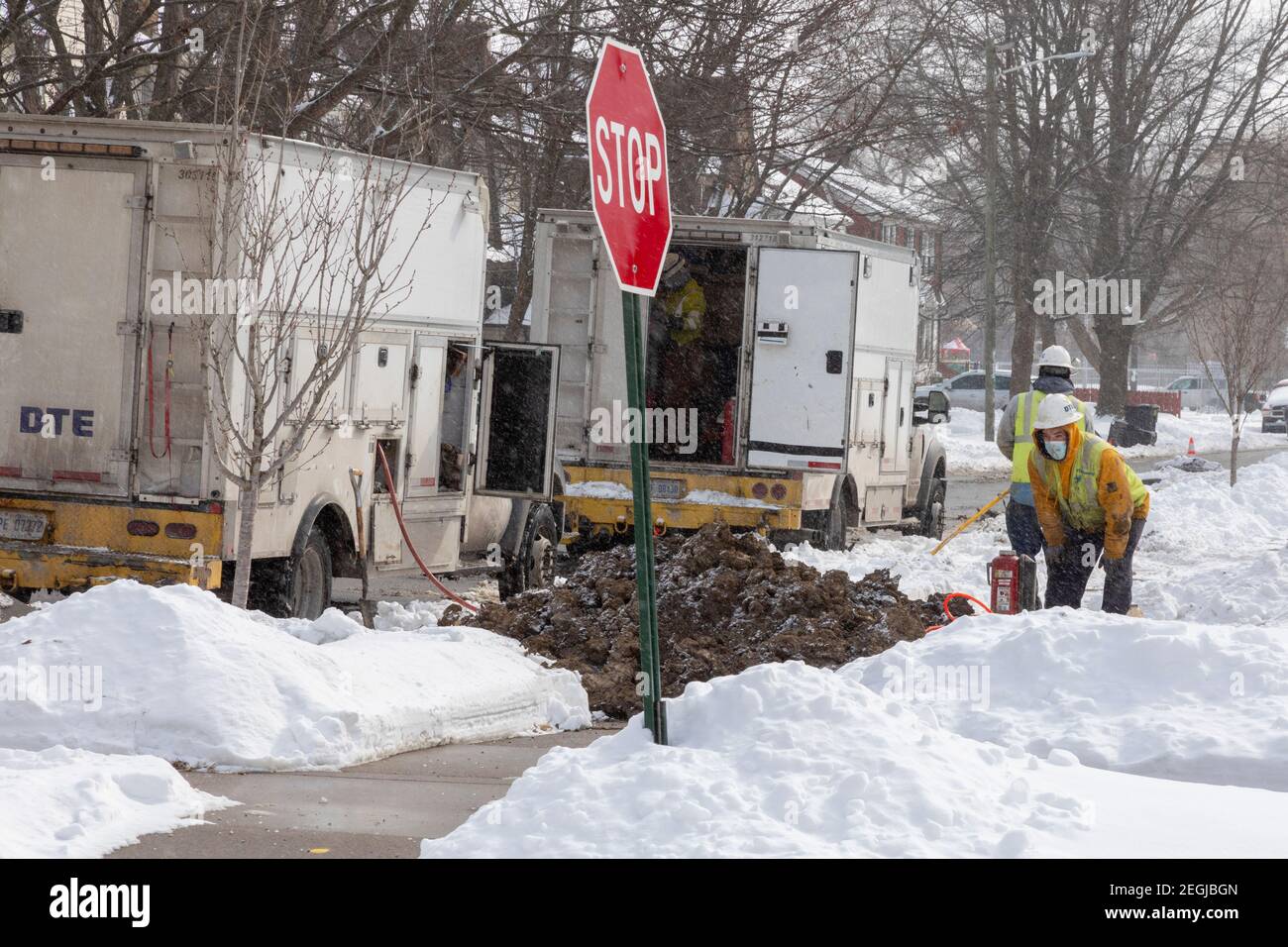 Detroit, Michigan, USA. 18th Feb, 2021. Workers for DTE Energy replace ...