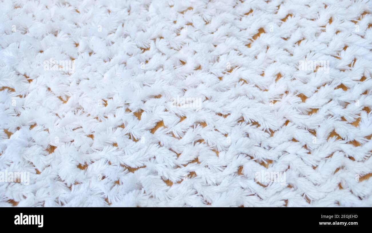 The texture of a white coat close up background Stock Photo - Alamy