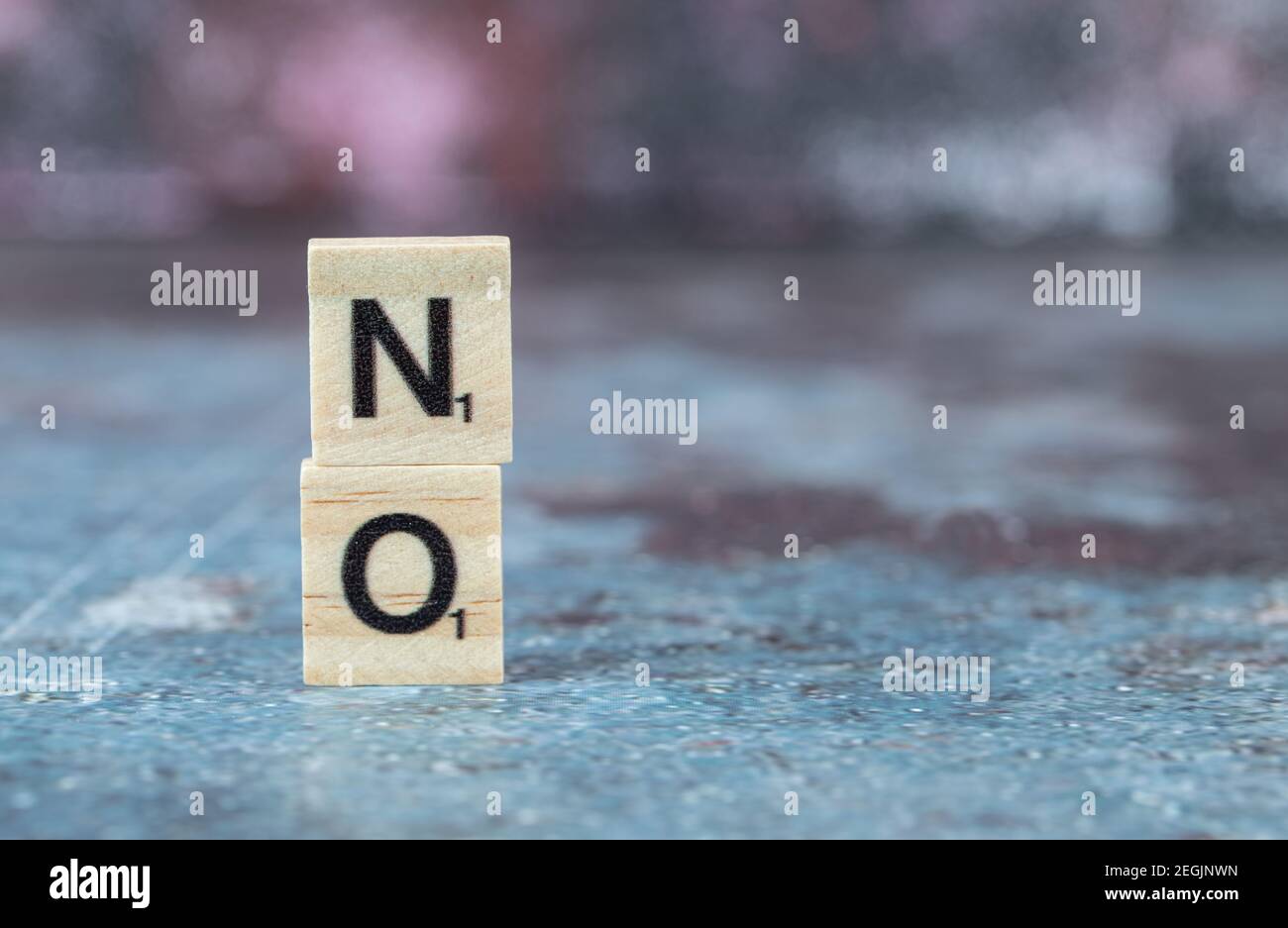 No symbolic writing with black letters on wooden dices in vertical ...