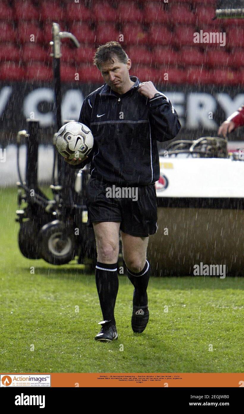 Referee does pitch inspection hi-res stock photography and images - Alamy