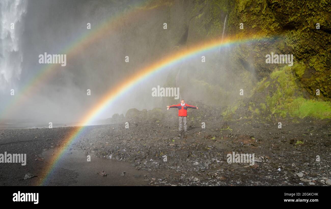 Man standing under waterfall hi-res stock photography and images - Alamy