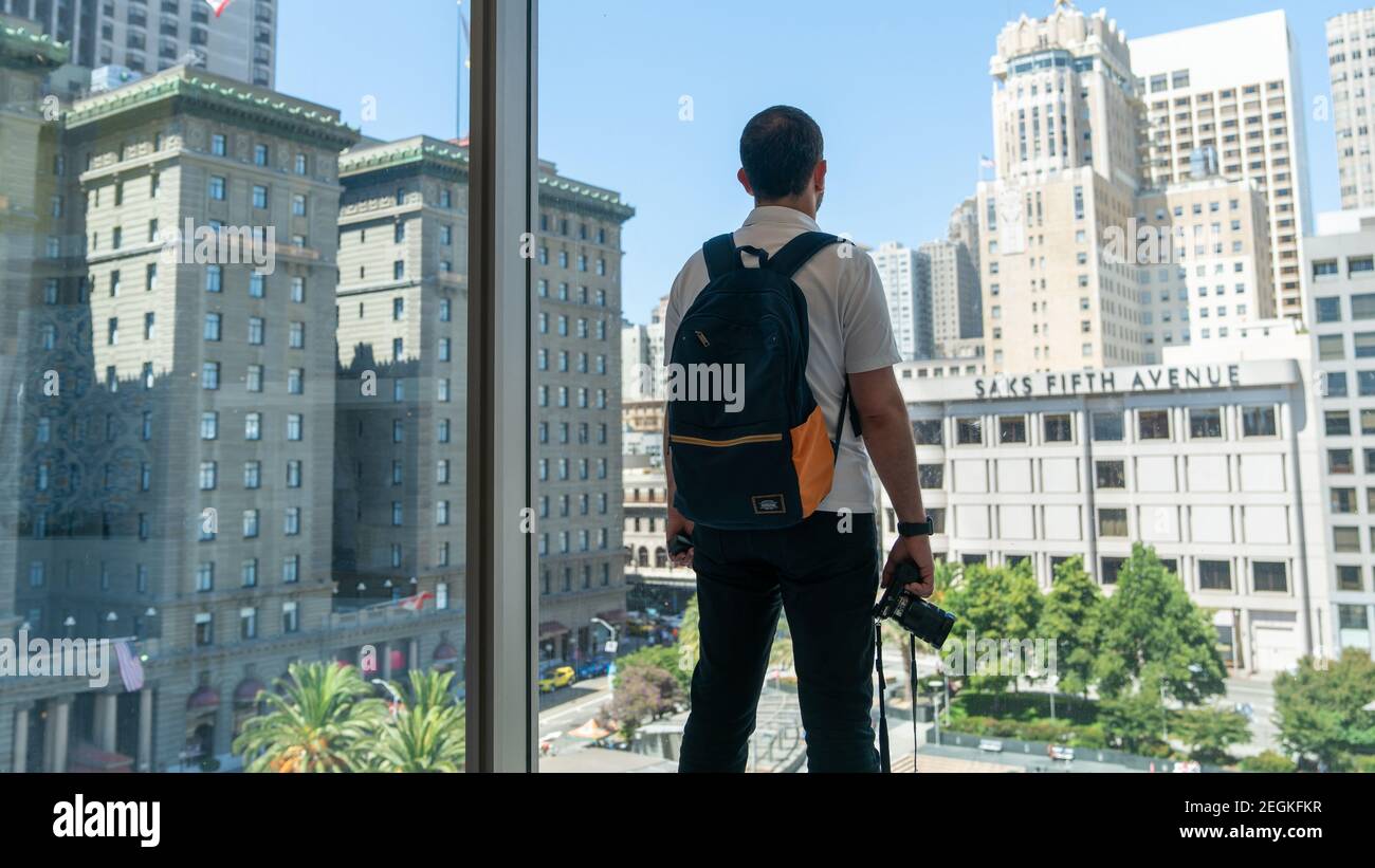 San Francisco, USA - August 2019: Young man looking at Union Square ...