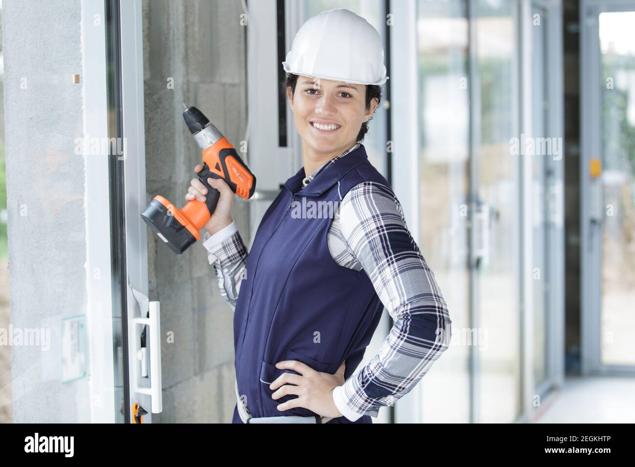 woman using some power tools for work at home Stock Photo - Alamy