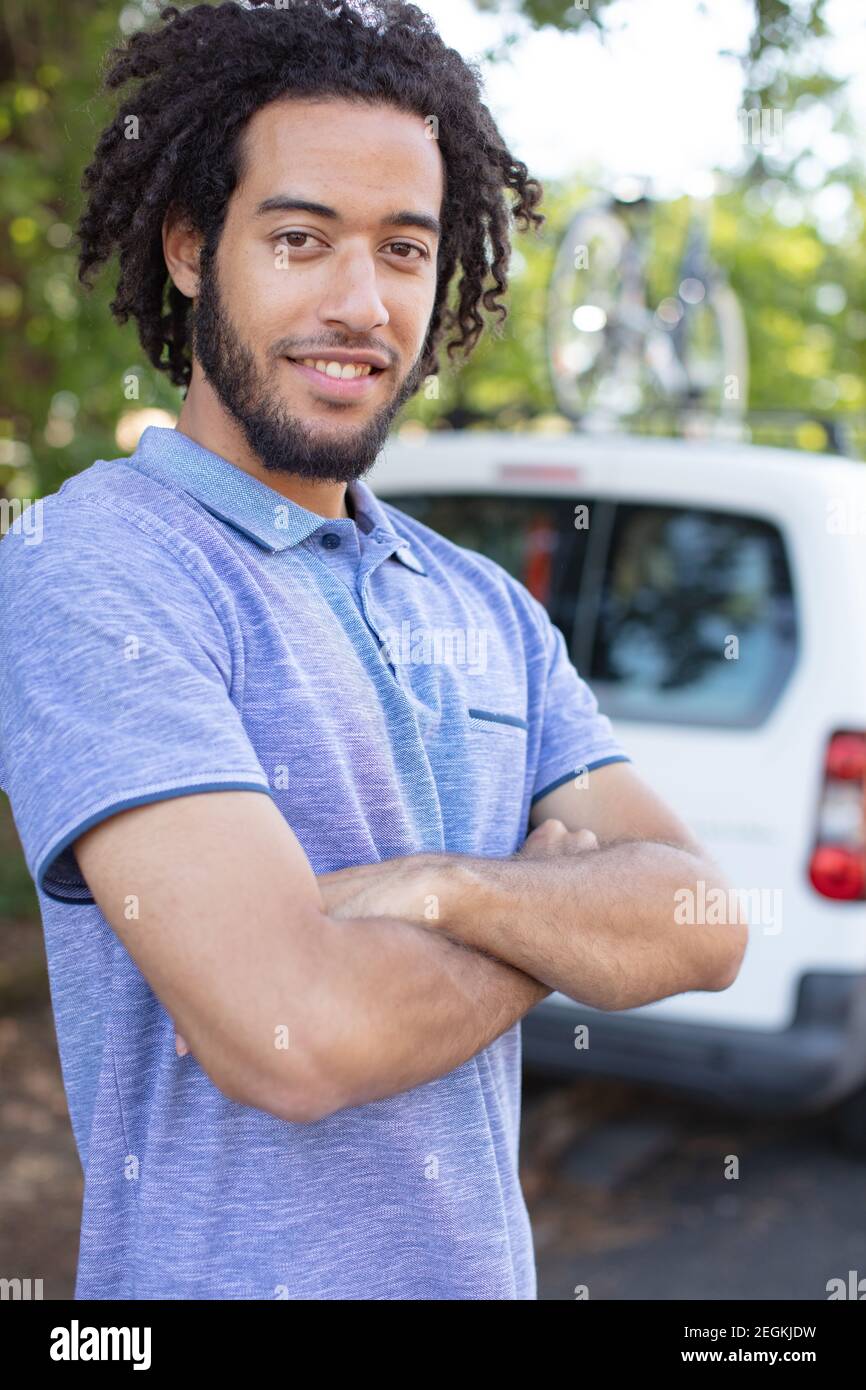 handsome man standing in front of car Stock Photo - Alamy
