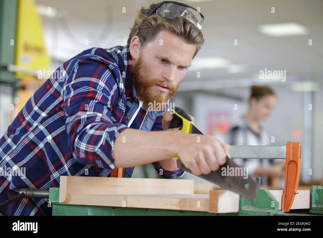 Man using handsaw hi-res stock photography and images - Alamy
