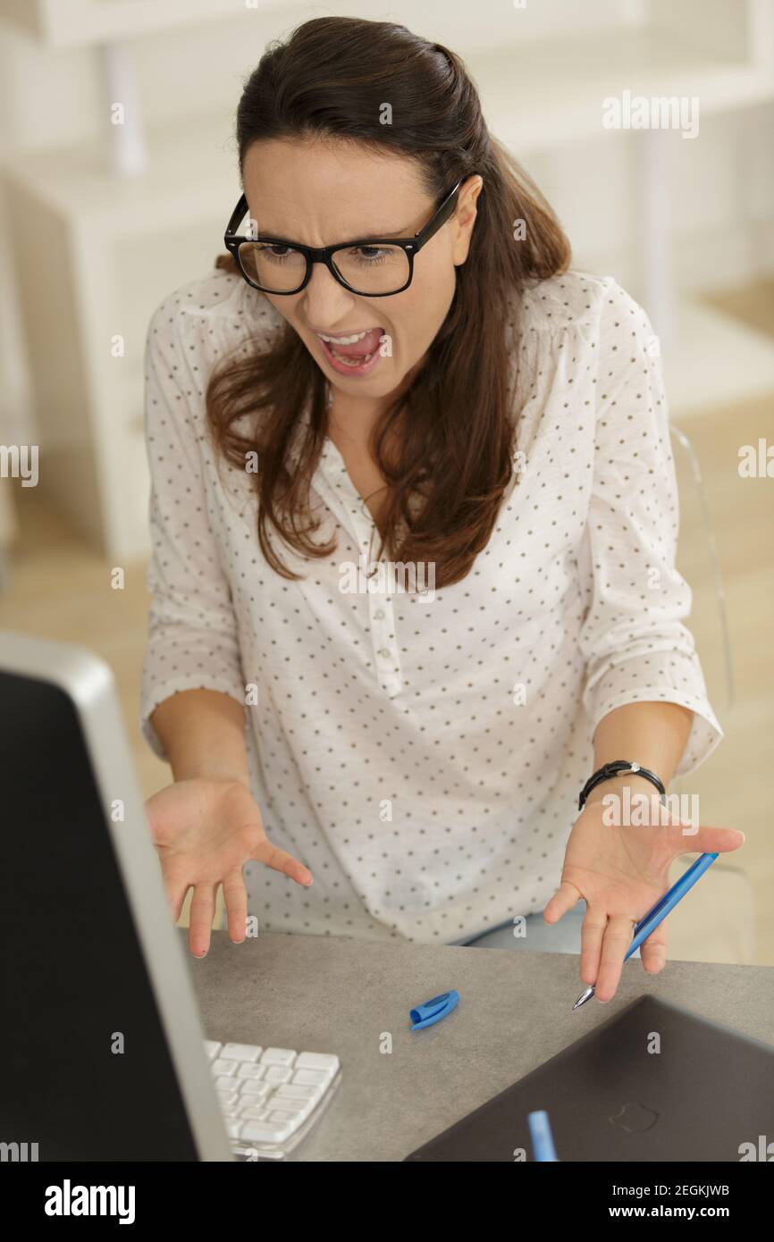 woman is angry about computer Stock Photo - Alamy