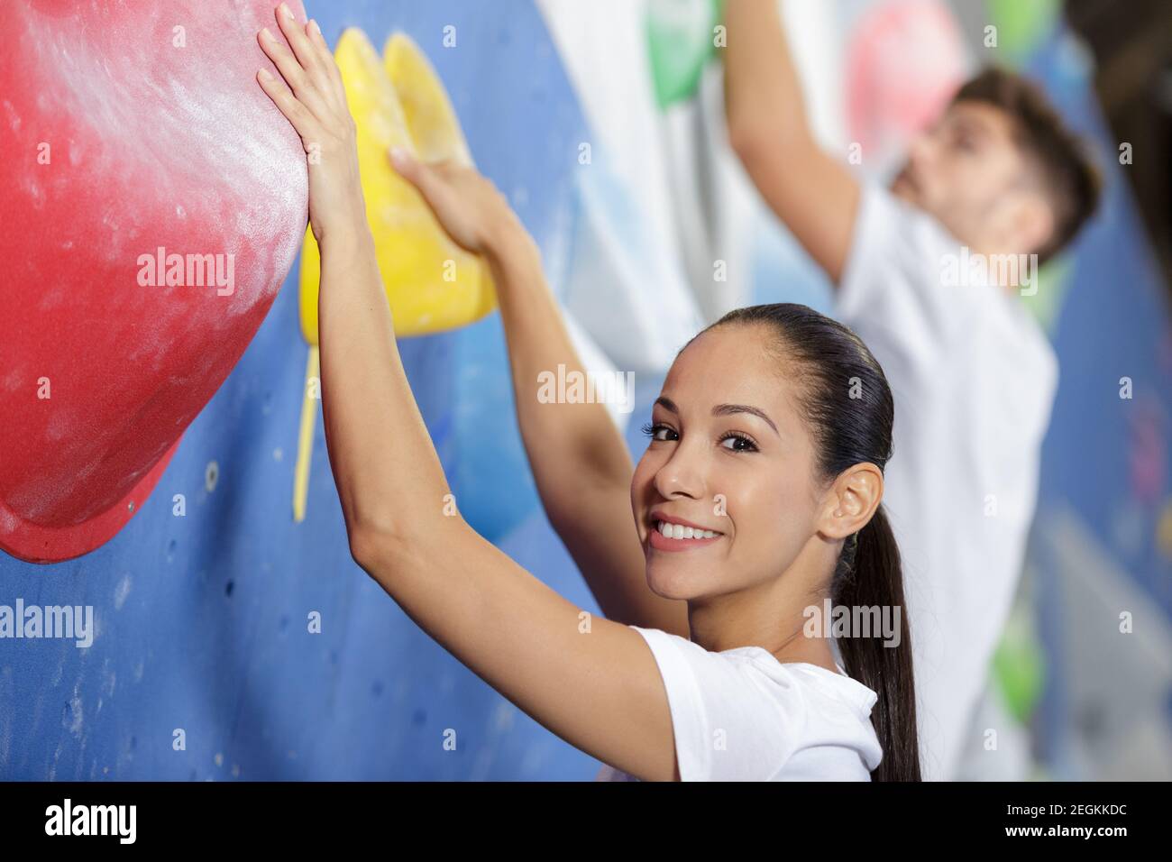 portrait of a woman climbing indoor Stock Photo - Alamy