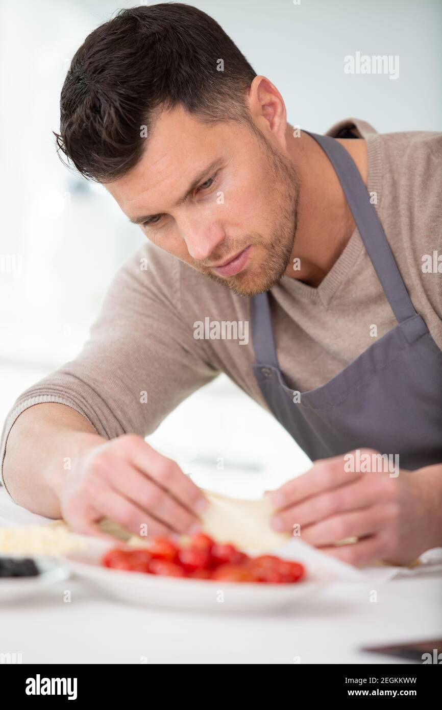 Spooning sauce onto base hi-res stock photography and images - Alamy