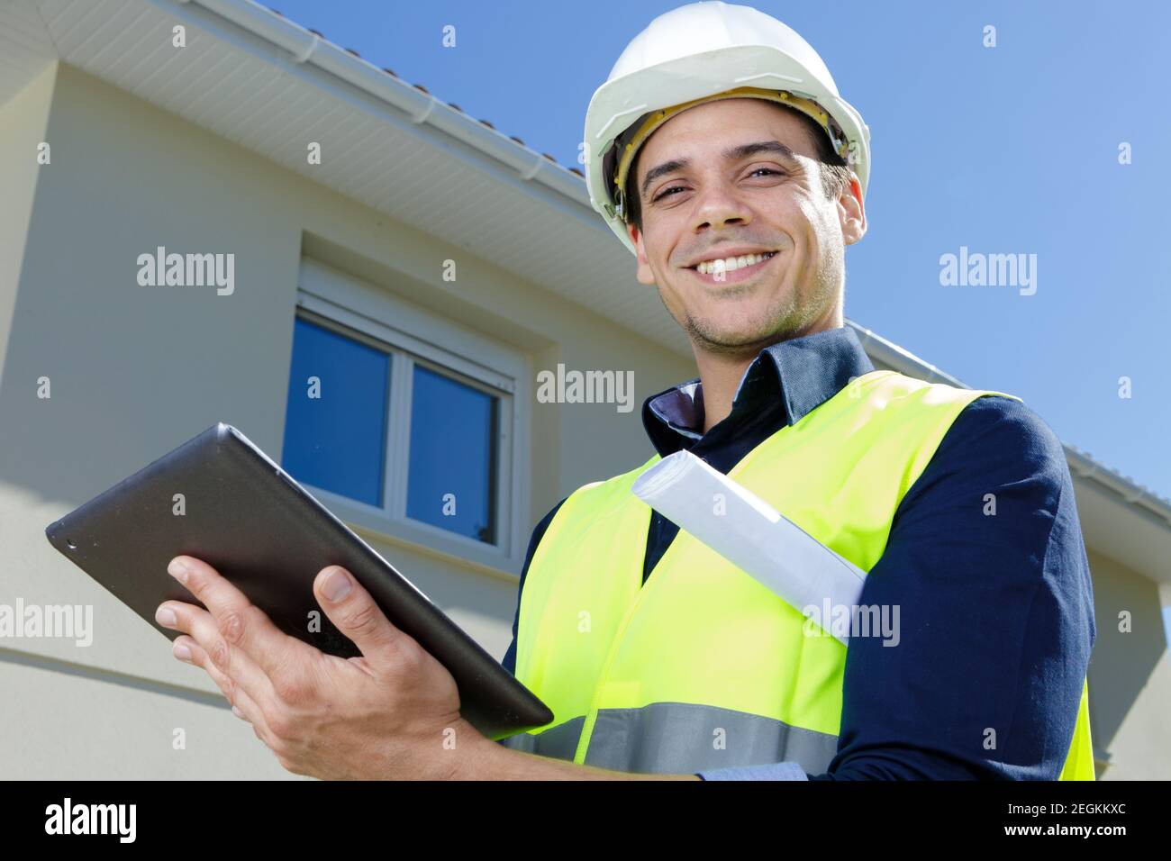 happy building inspector looking at house renovation project Stock ...