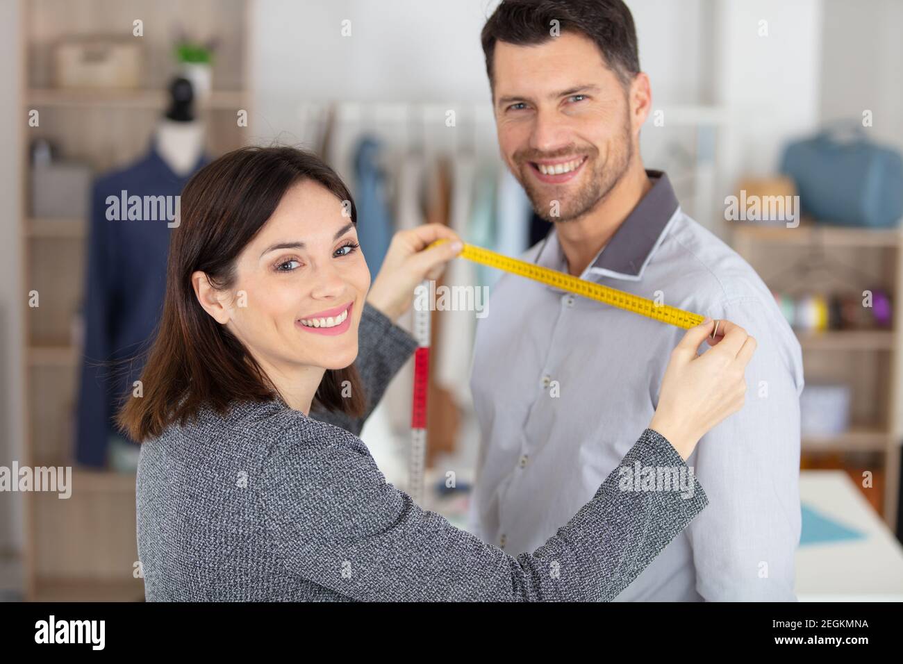 Tailor taking measurements customer hi-res stock photography and images ...