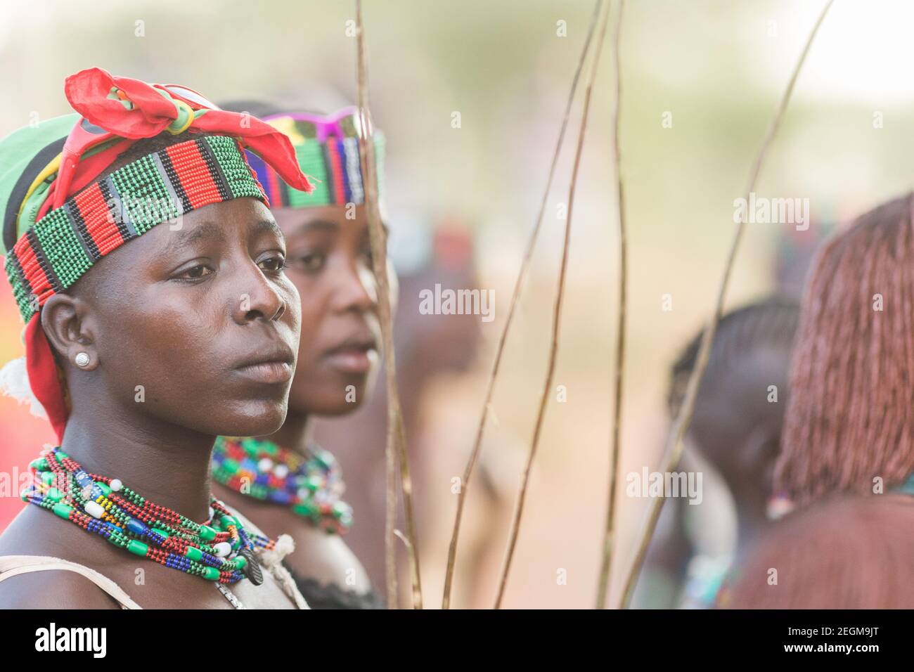 Portrait of a woman from the Banna tribe attending a bull jumping ...