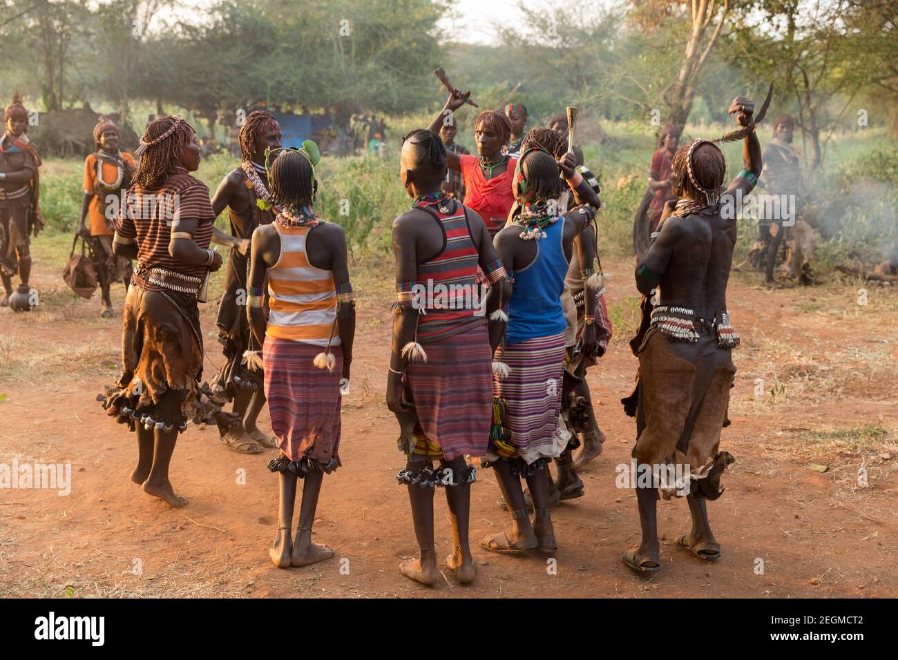 Women from the Banna tribe dancing before a bull jumping ceremony. The ...