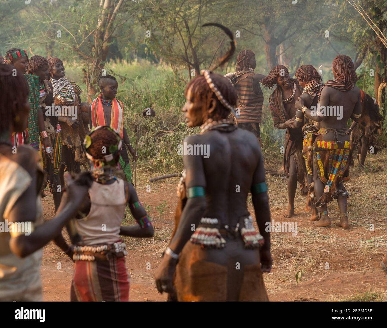 Women from the Banna tribe dancing before a bull jumping ceremony. The ...