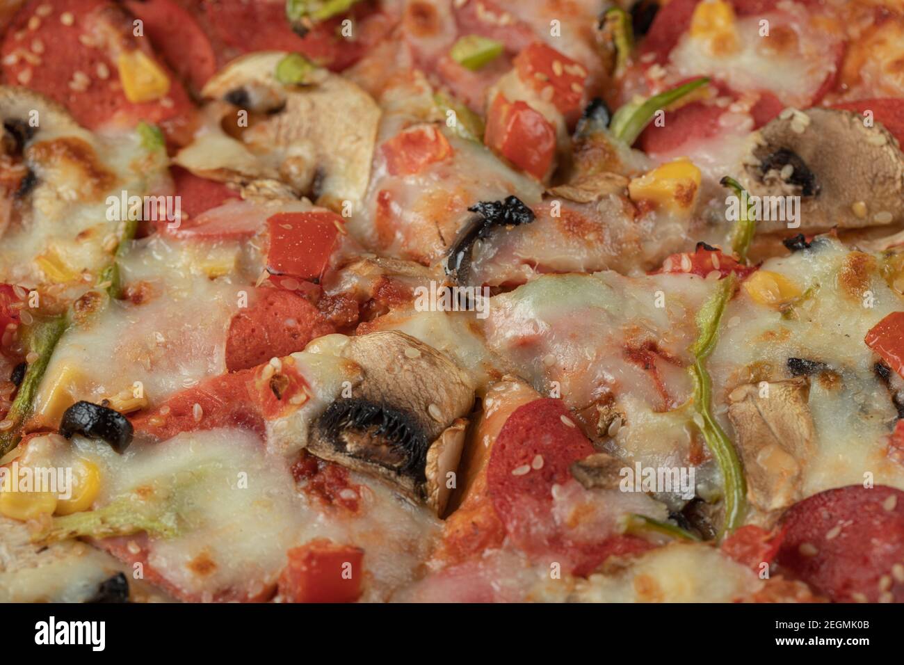 Cooked mixed ingredient pizza hi-res stock photography and images - Alamy